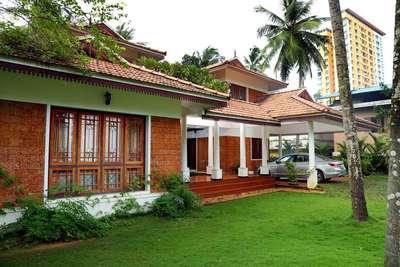 Designs by Building Supplies Kannur Laterite Stone Cladding Tiles ...
